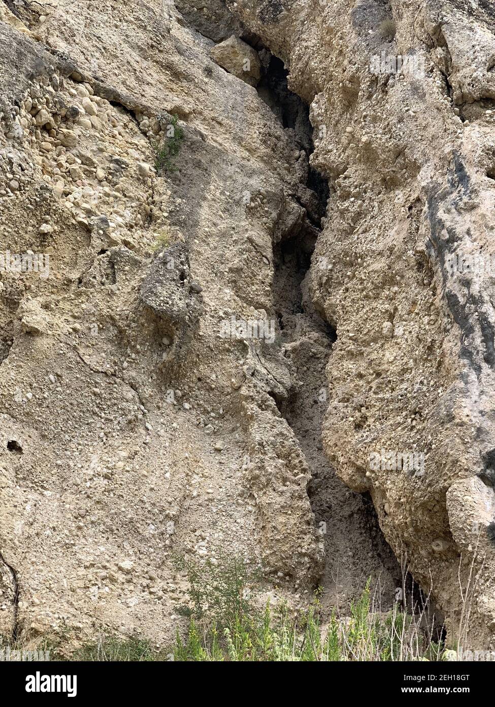 Vertical low angle shot of a cliff captured during the daytime Stock ...