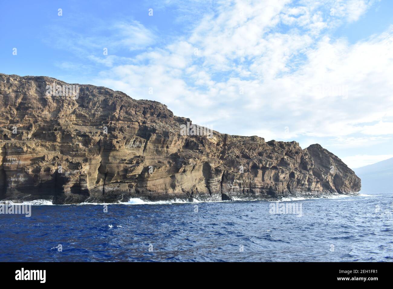 Molokini Crater rock emerging from the Pacific Ocean near the Hawaiian ...