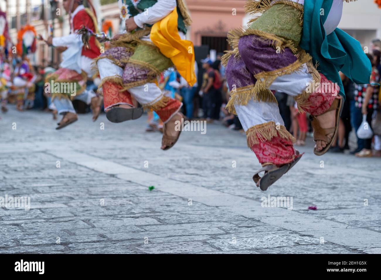 OAXACA CITY, MEXICO - Dec 21, 2019: Zapotec men doing the Dance of the ...