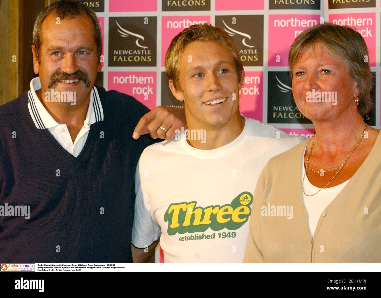 Flanked by father hi-res stock photography and images - Alamy