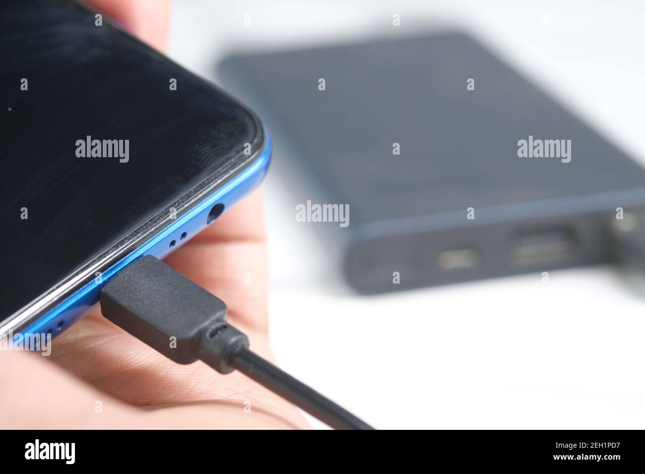 smart phone charging with Power bank top view Stock Photo - Alamy