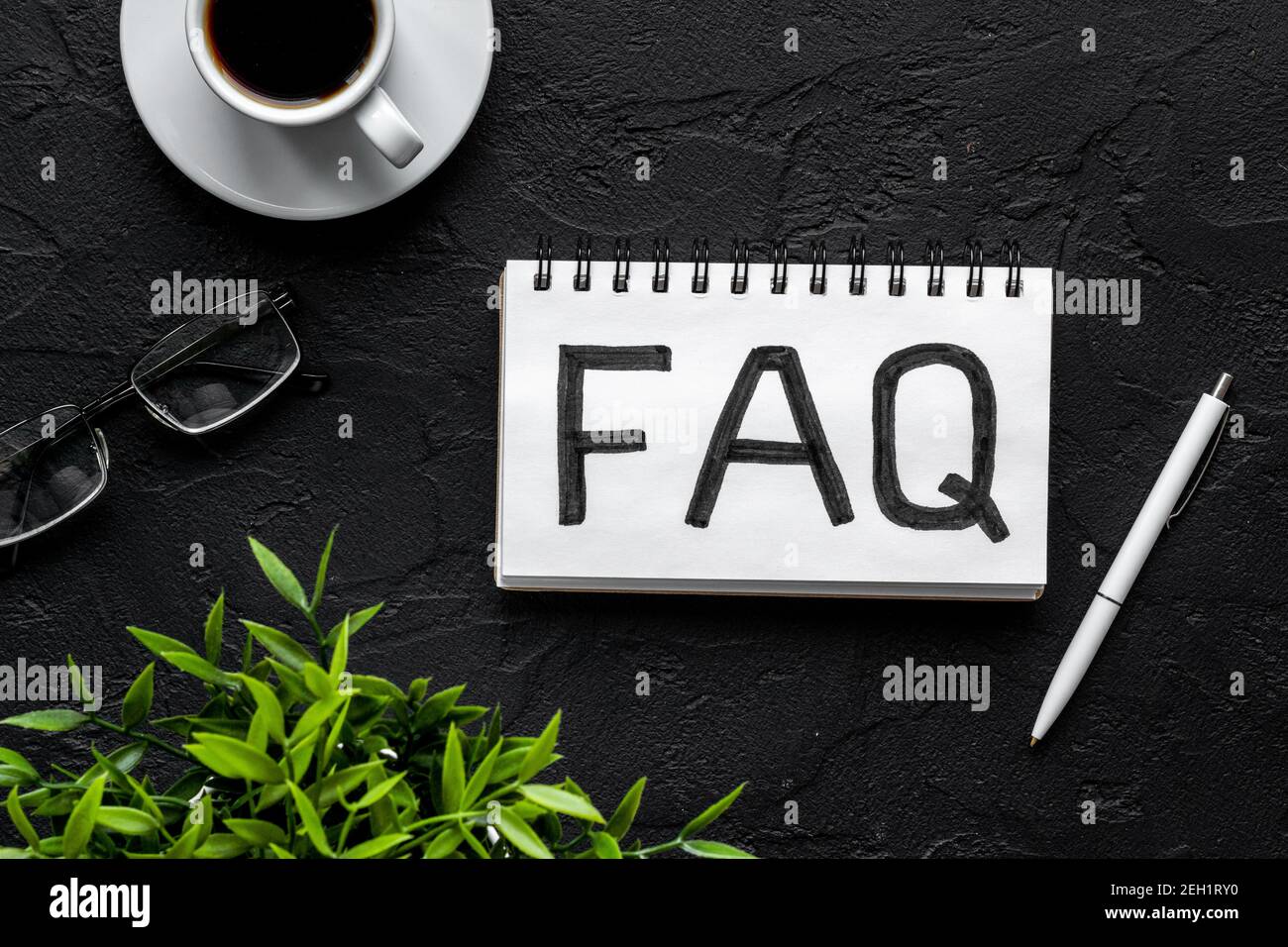 FAQ concept. Text on office table. Information Helpdesk Stock Photo - Alamy