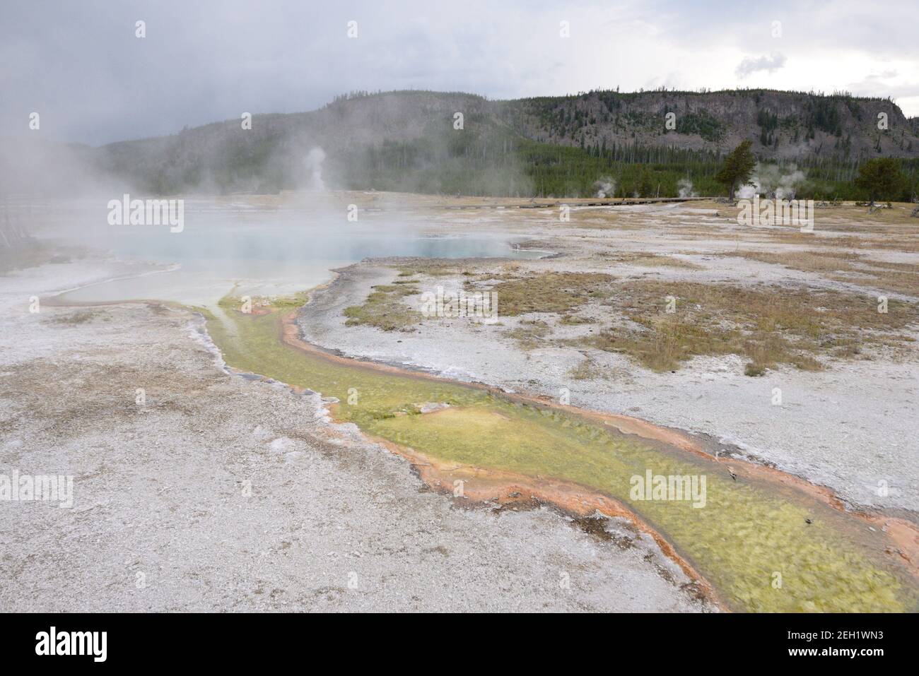 Colorful geothermal features at Old Faithful geothermal area in ...