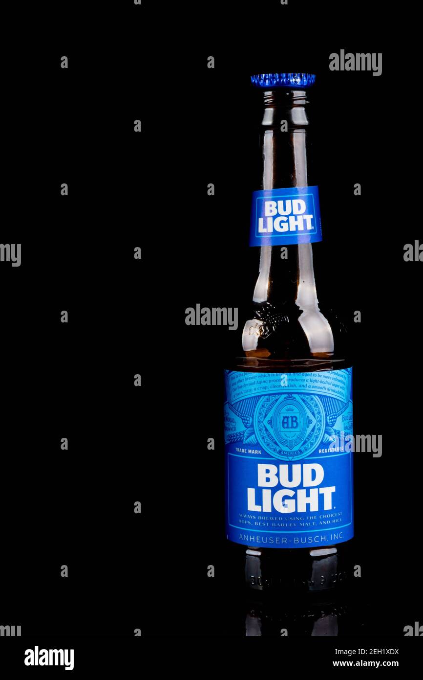 Sandhurst, United Kingdom; February 16th 2021:- An open bottle of Bud ...