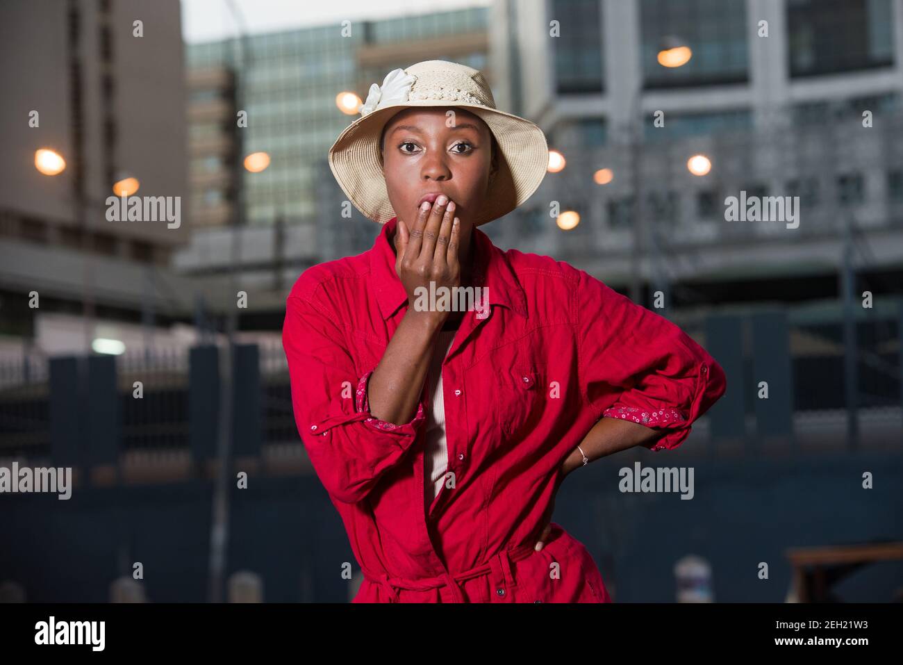 African Woman Hand Over Mouth High Resolution Stock Photography and ...