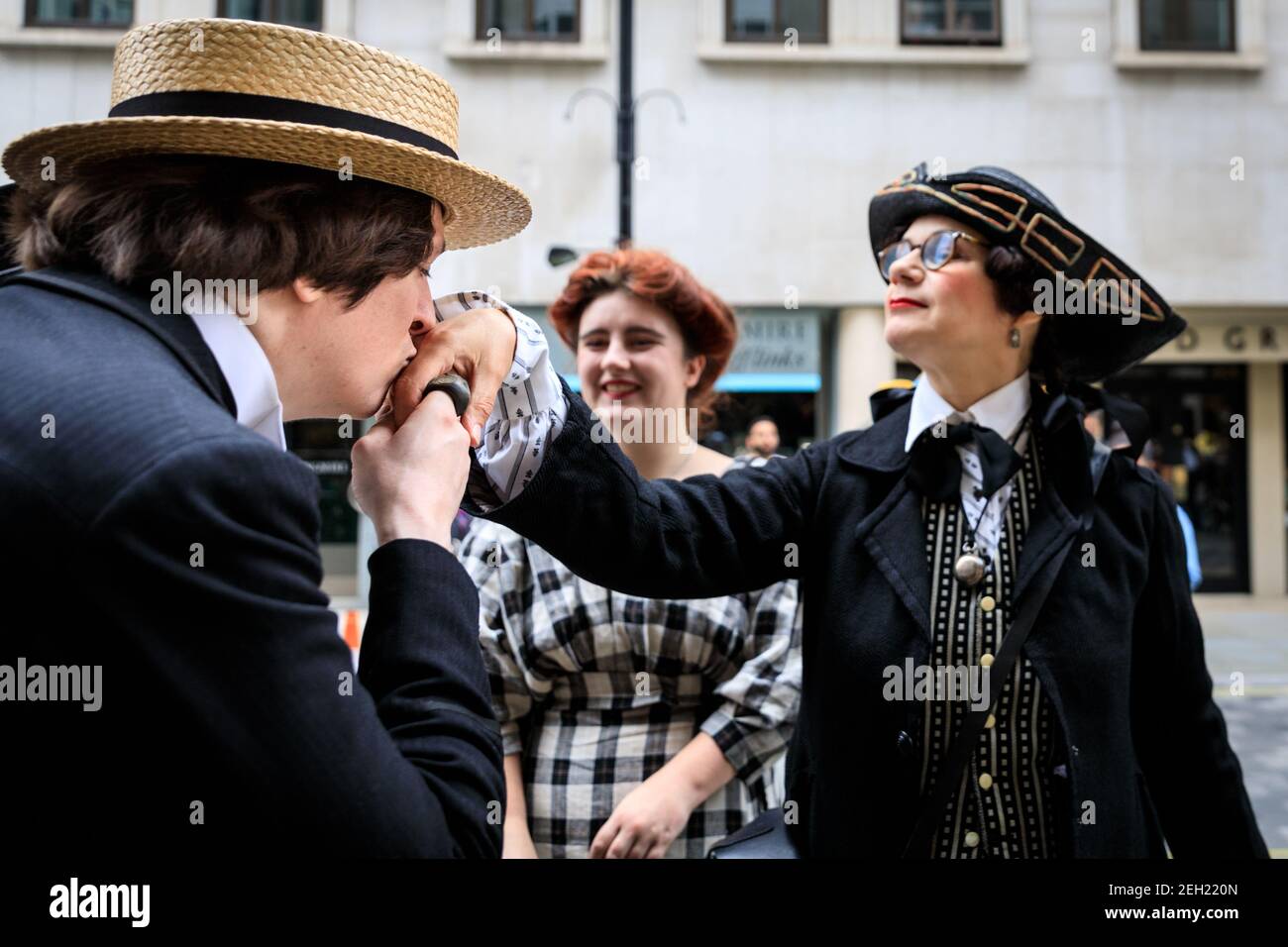 Gentleman kissing a lady's hand at ' The Grand Flaneur' Chap Walk ...