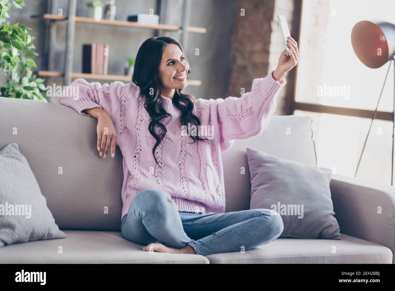 Full length photo of positive happy cute lady look phone make selfie ...