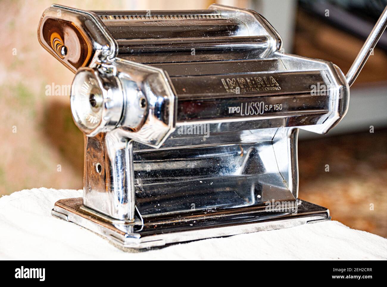 Traditional pasta making fresh past with vintage hand machine Stock ...