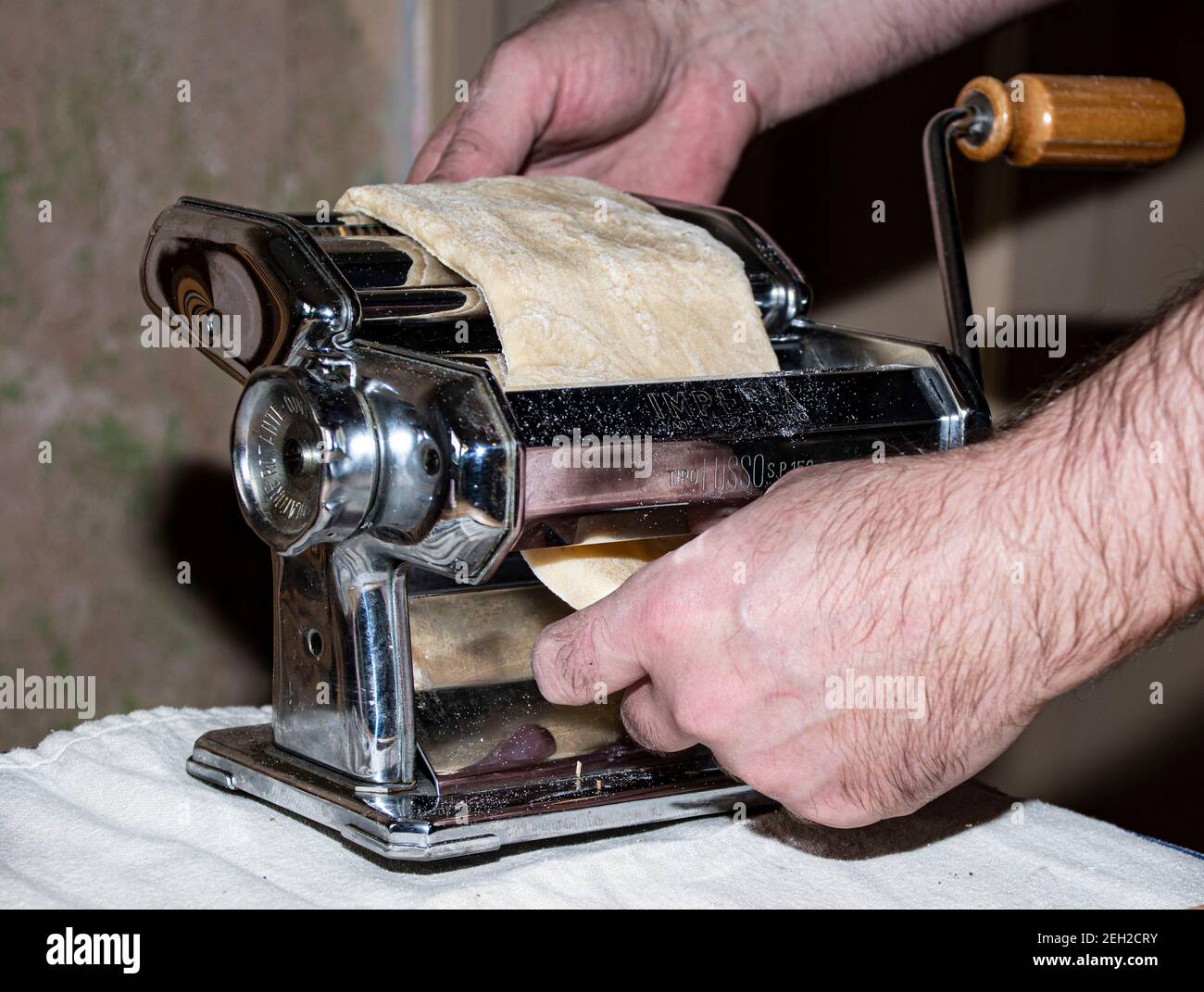 Traditional pasta making fresh past with vintage hand machine Stock ...