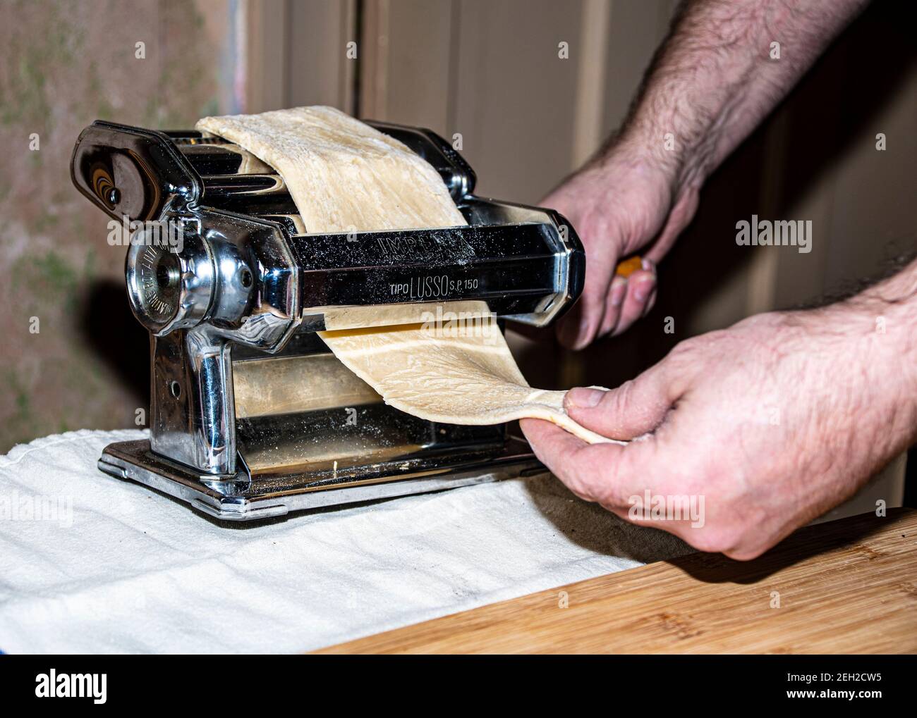 Traditional pasta making fresh past with vintage hand machine Stock ...