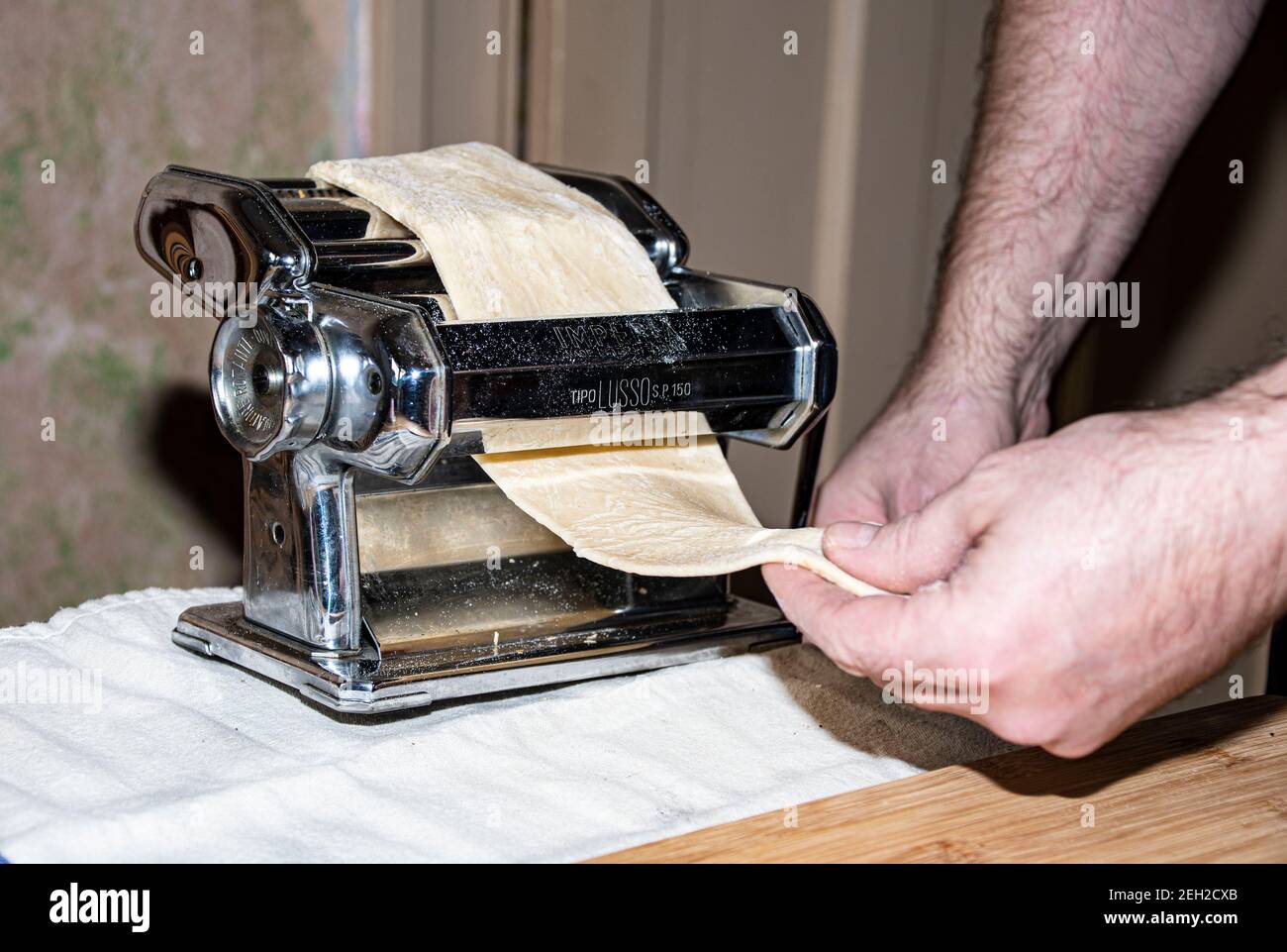 Traditional pasta making fresh past with vintage hand machine Stock ...