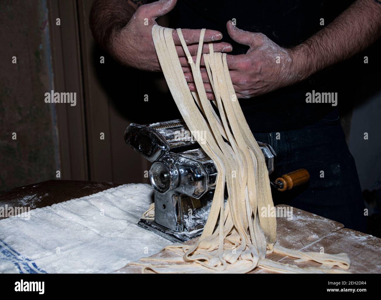 Traditional pasta making fresh past with vintage hand machine Stock ...