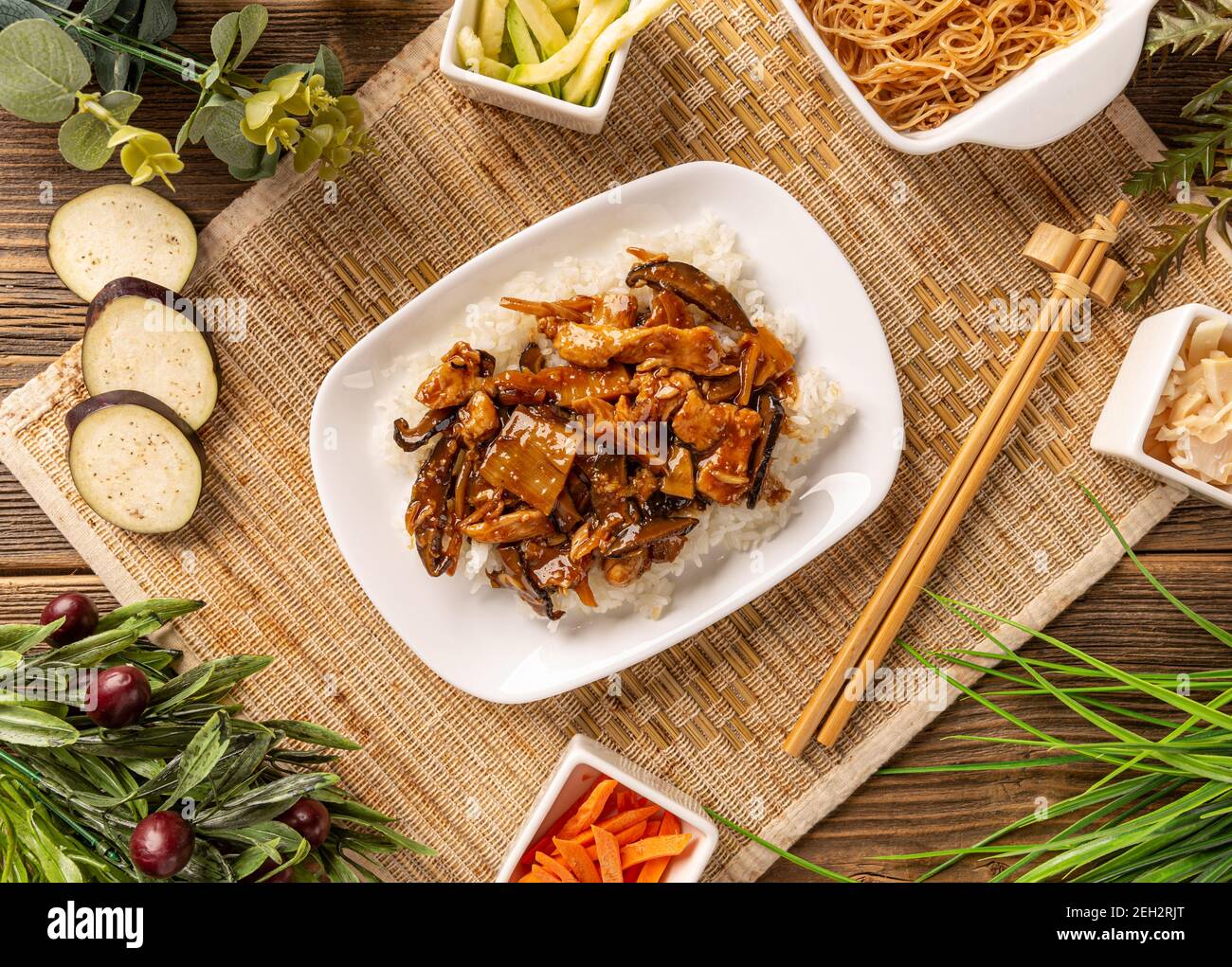 Chinese foog, rice with bamboo shoots served on white plate Stock Photo ...