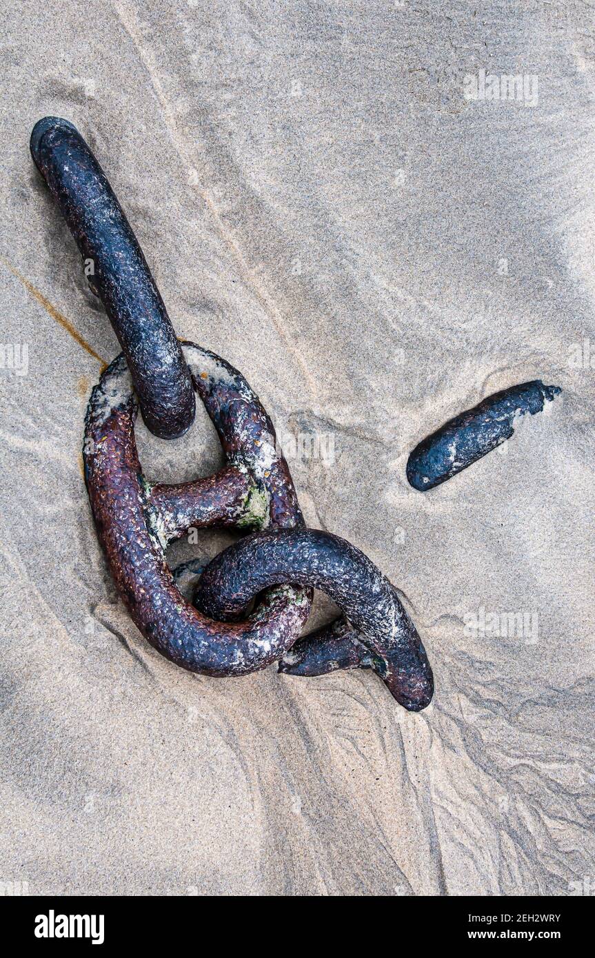 Chain in sand Stock Photo - Alamy