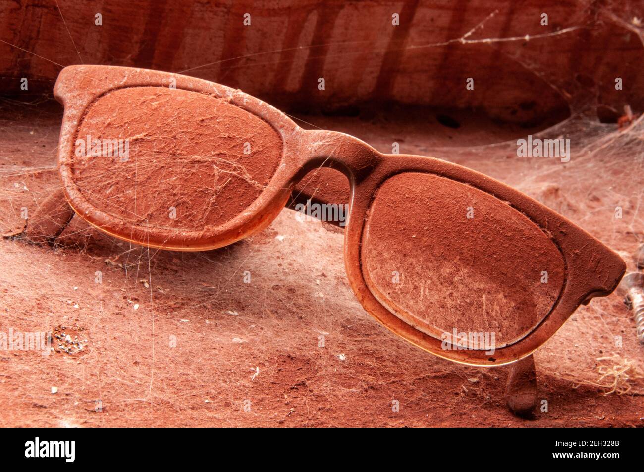 Abandoned dusty safety glasses Stock Photo - Alamy
