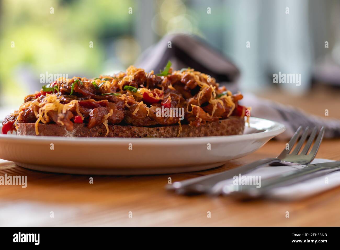 Toast (fried bread) with meat mixture. Delicious food. Meat toast with ...