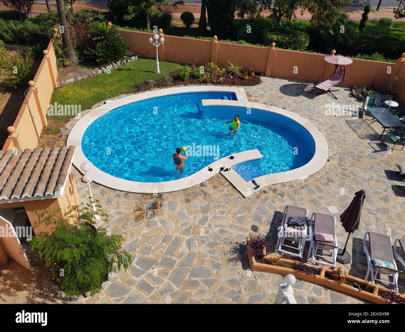 Two water polo players in the swimming pool playing water polo Stock ...