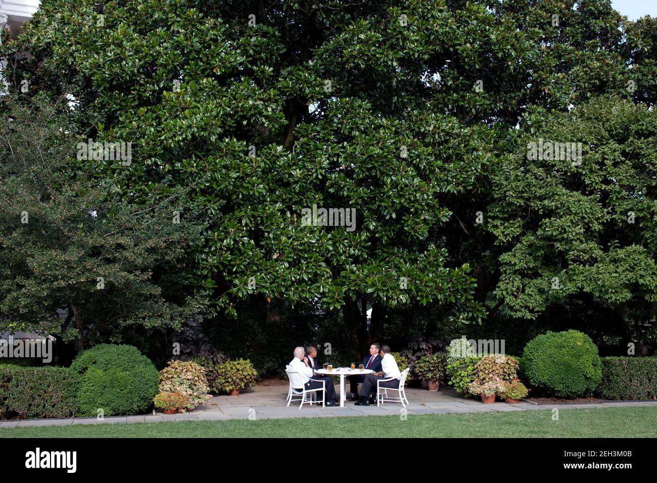 President Barack Obama and Vice President Joe Biden, have a beer with ...