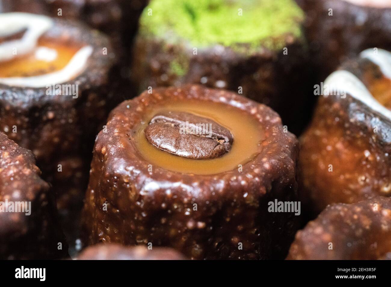 Caneles de bordeaux is a small pastry with rum and vanilla, traditional ...