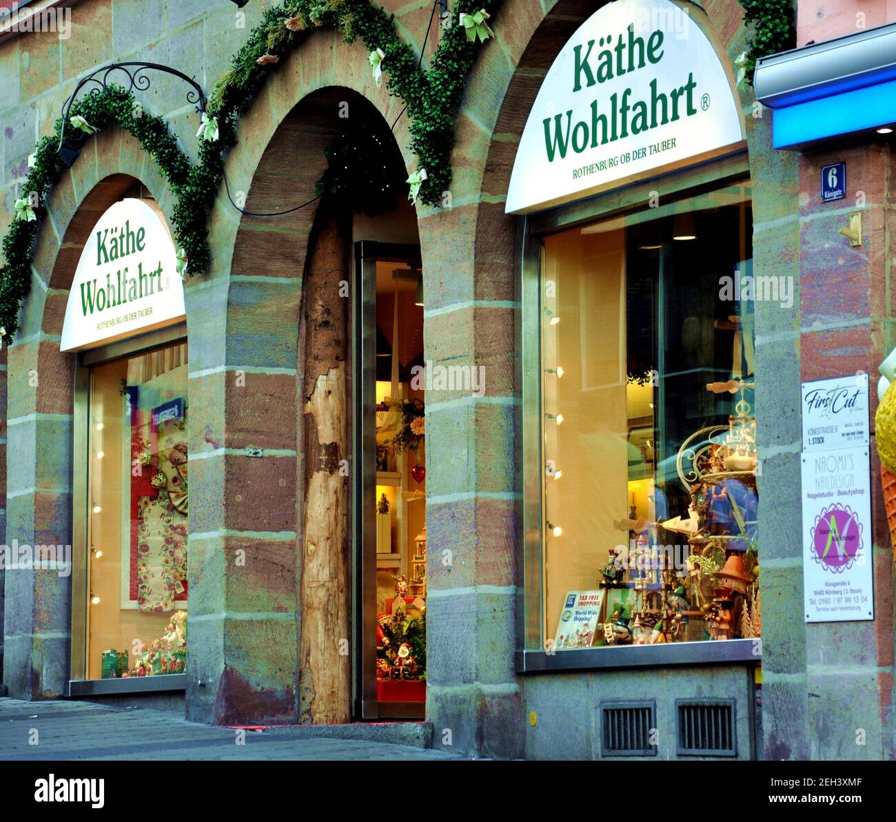 Old architecture building with a store at the ground floor Stock Photo ...