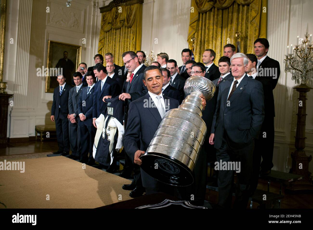 President Barack Obama lifts the Stanley Cup trophy during the East ...