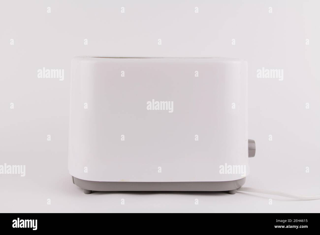 a kitchen white bread toaster on white background Stock Photo - Alamy