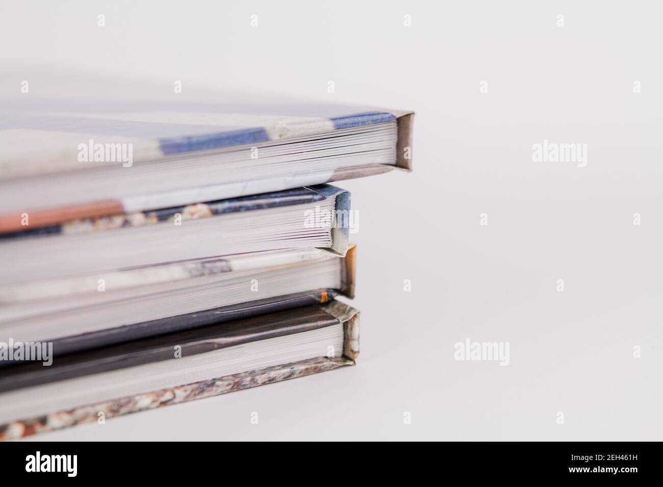 a books are in a pile on top of each other on a white background Stock ...