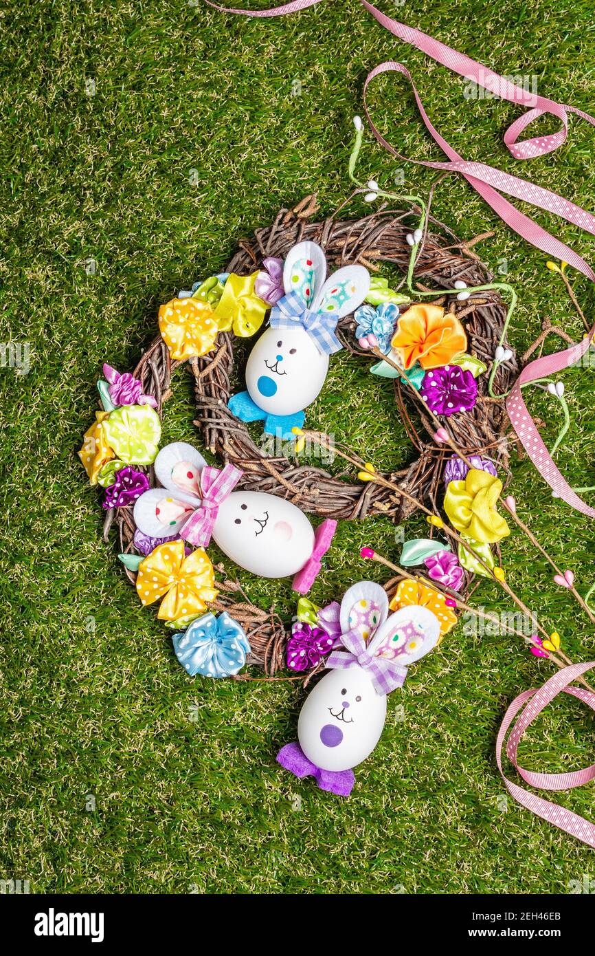 Traditional Easter symbols festive background. Handmade cute rabbits ...