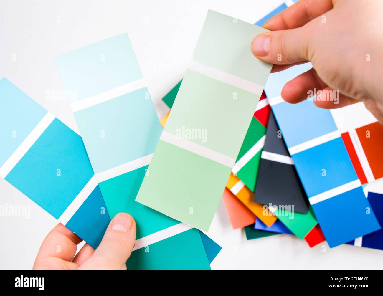 High angle view of color cards on the white background, colorful ...