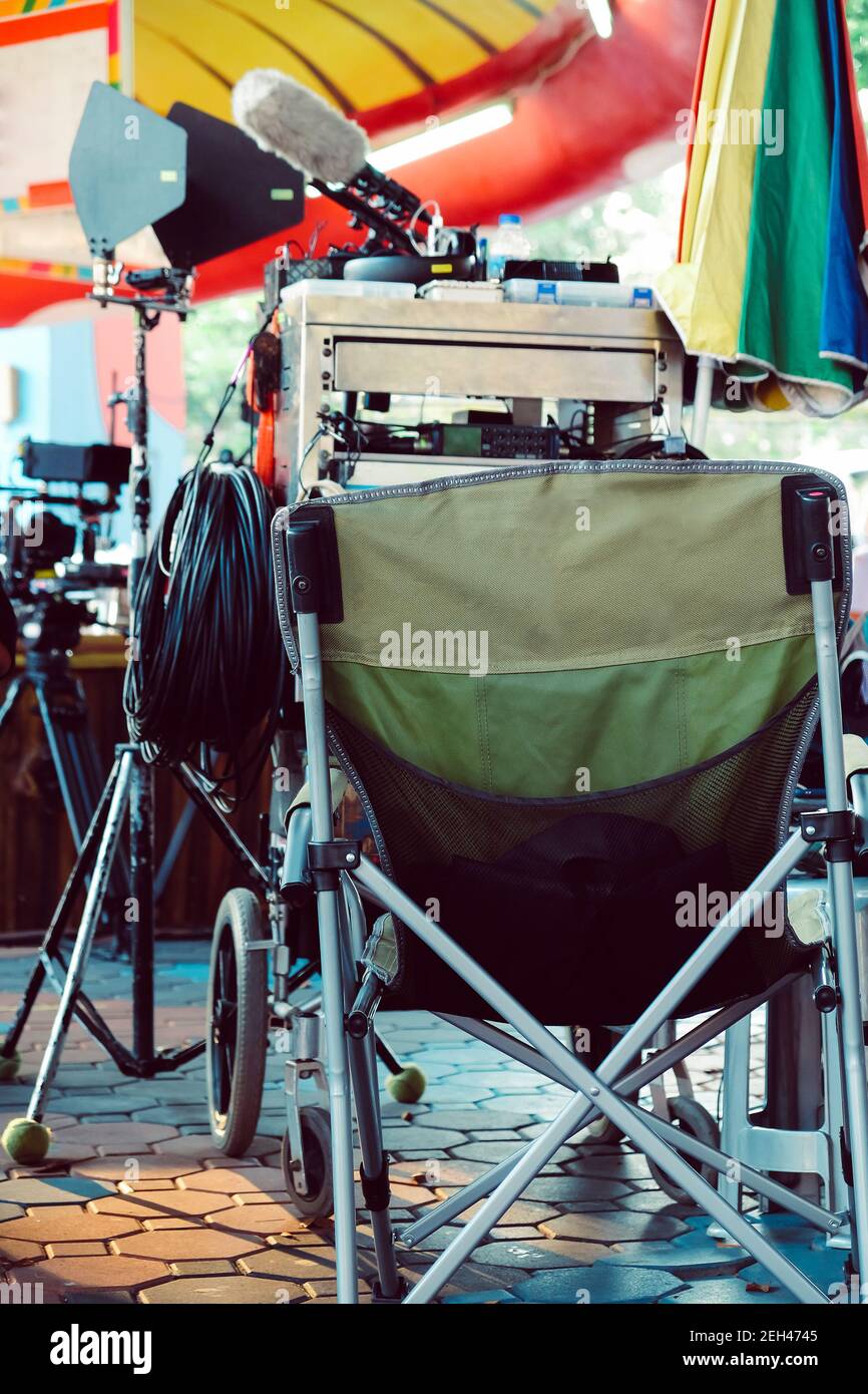 Film crew equipment, Detail image of director's chair on a film set ...