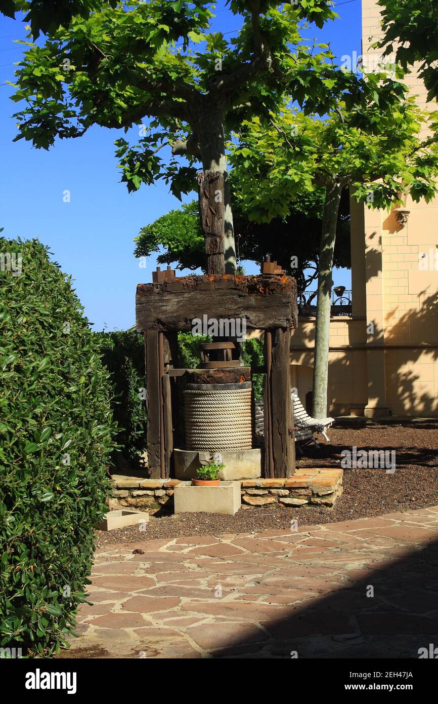 Old grape press for making wine Stock Photo - Alamy