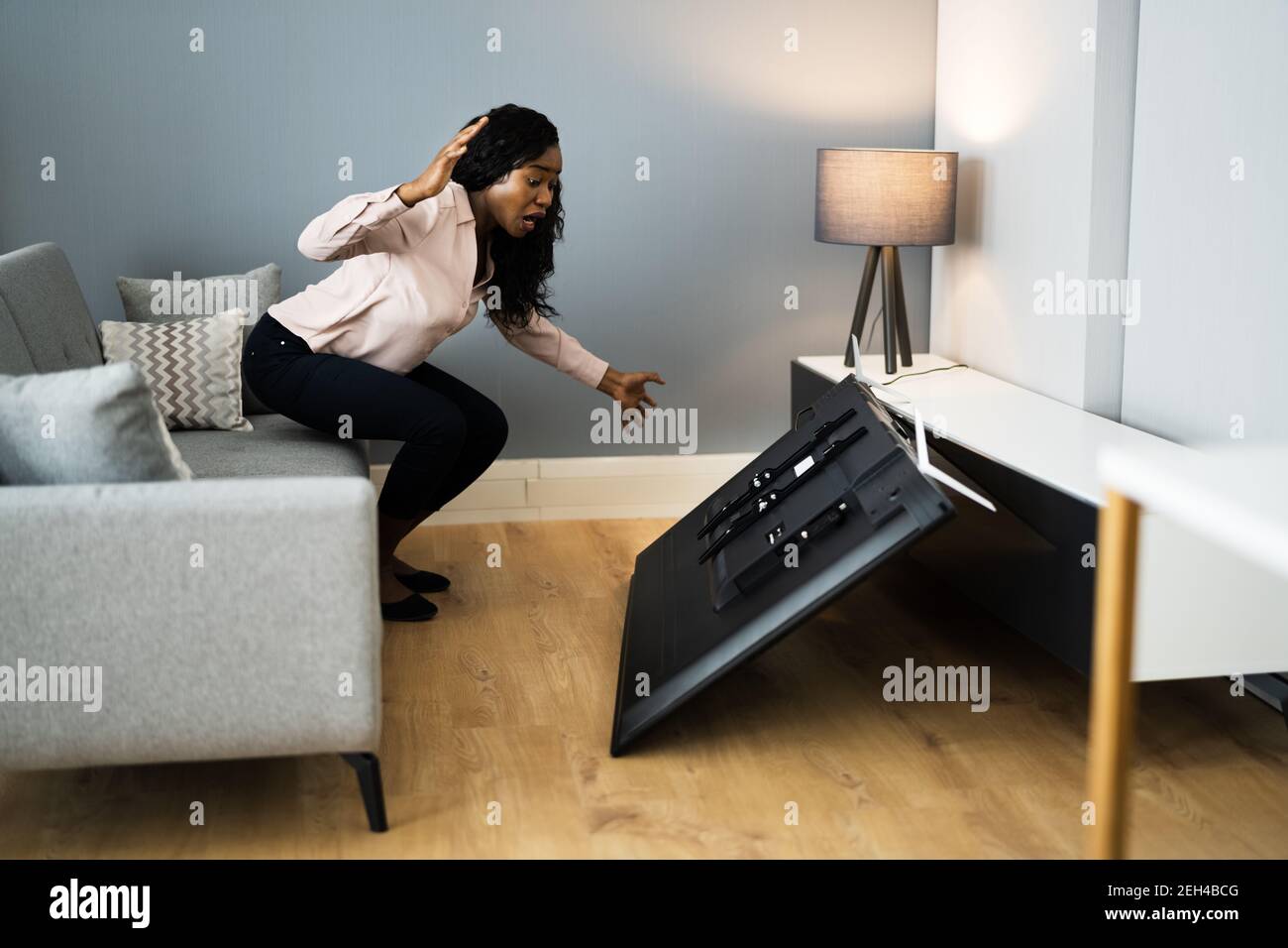 Broken Fallen TV On Television Damage Accident Stock Photo - Alamy