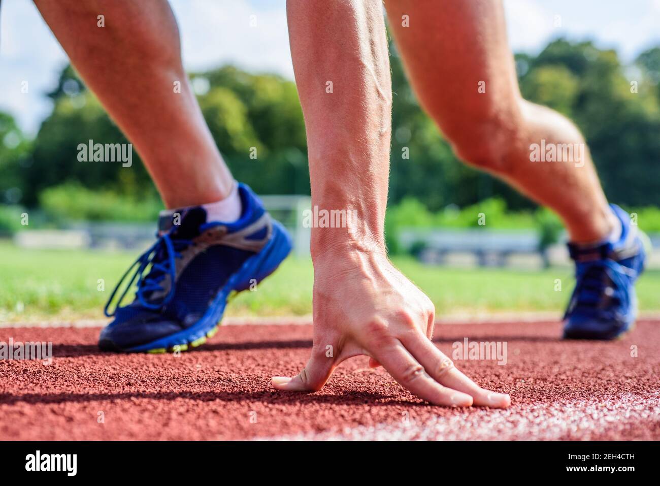 Runner ready to go close up. Ready steady go concept. At beginning of ...