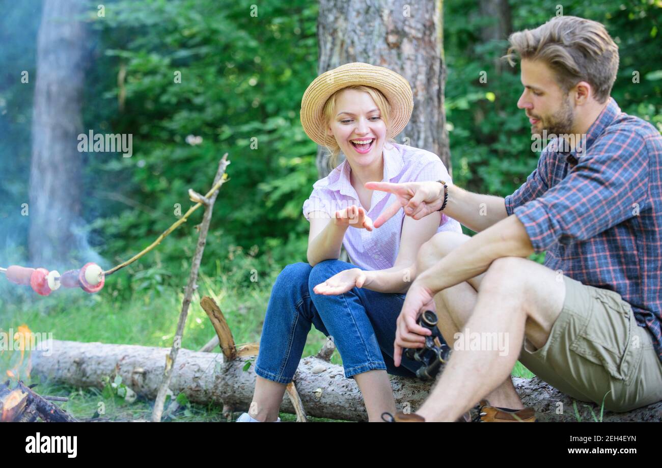 Hand gesture game decide who win. Winner eats first. Couple tourists ...