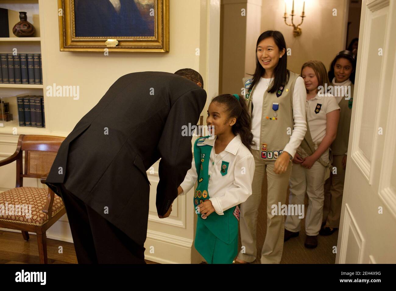 President Barack Obama greets Girl Scouts prior to a signing ceremony for the Girl Scouts USA ...