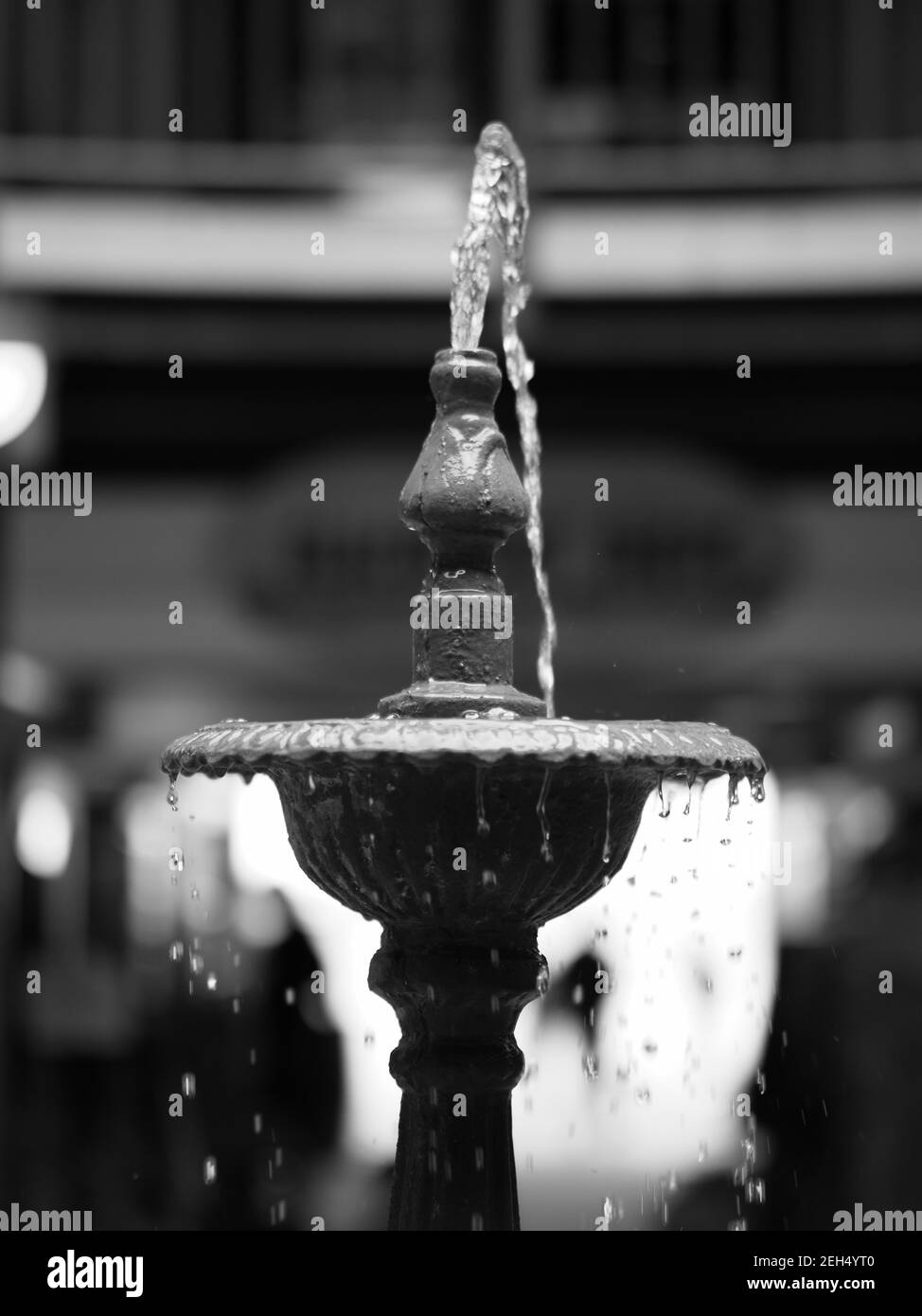 Monochromatic image of a fountain spraying water Stock Photo - Alamy