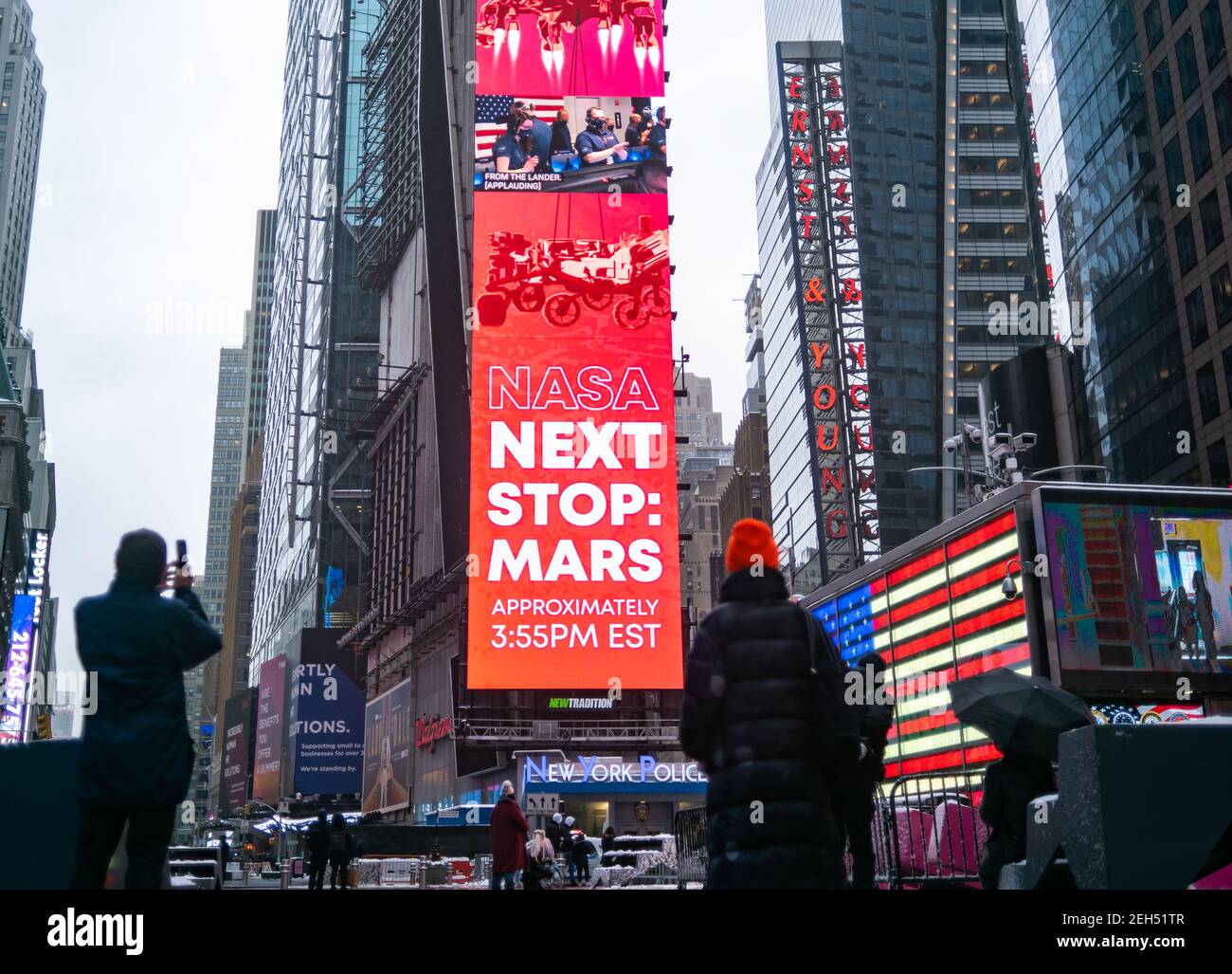 New York, USA. 18th Feb 2021. The news banner on the One Times Square ...