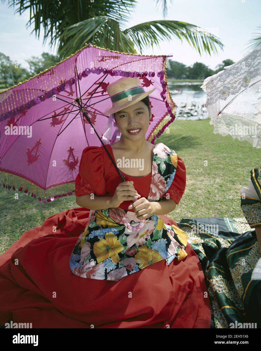 Asia,Philippines,Manila,portrait of beautiful smiling Filipino girl ...