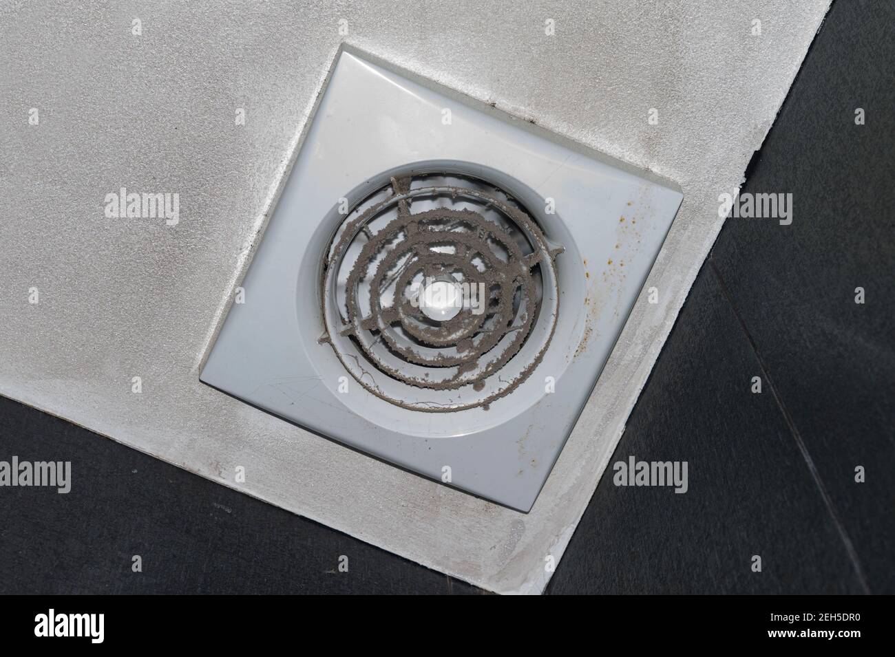 A ceiling ventilation clogged with dust layer, indoor shot Stock Photo ...