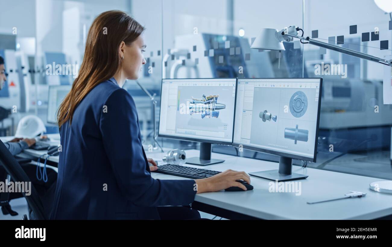 Portrait of Young and Confident Industrial Engineer Working on Computer ...