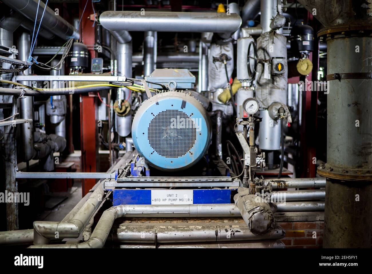 Large blue metal electric water pump turbine motor in industrial power ...