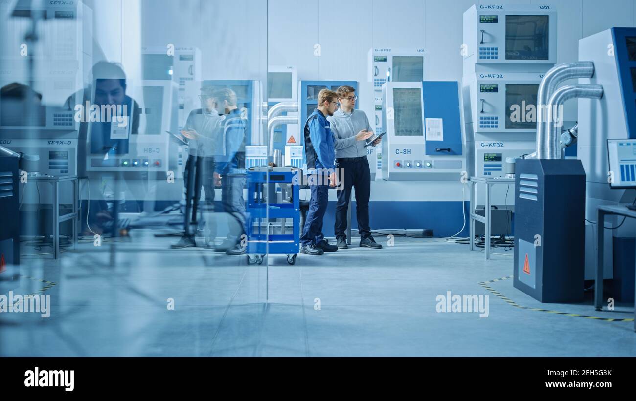 Female machine operator using digital hi-res stock photography and ...
