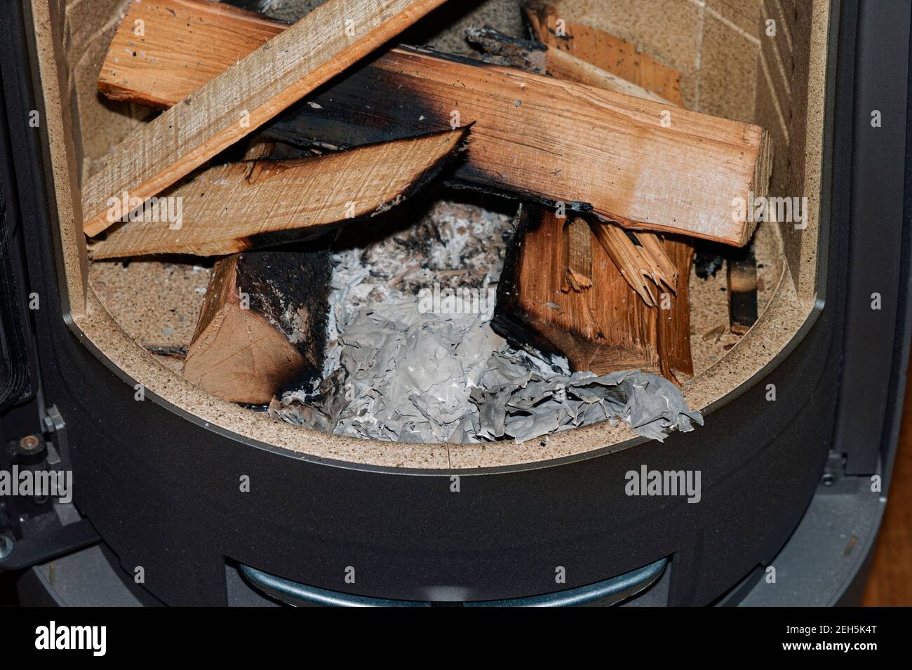 Extinct wood burning fireplace with open door and needs to be cleaned ...