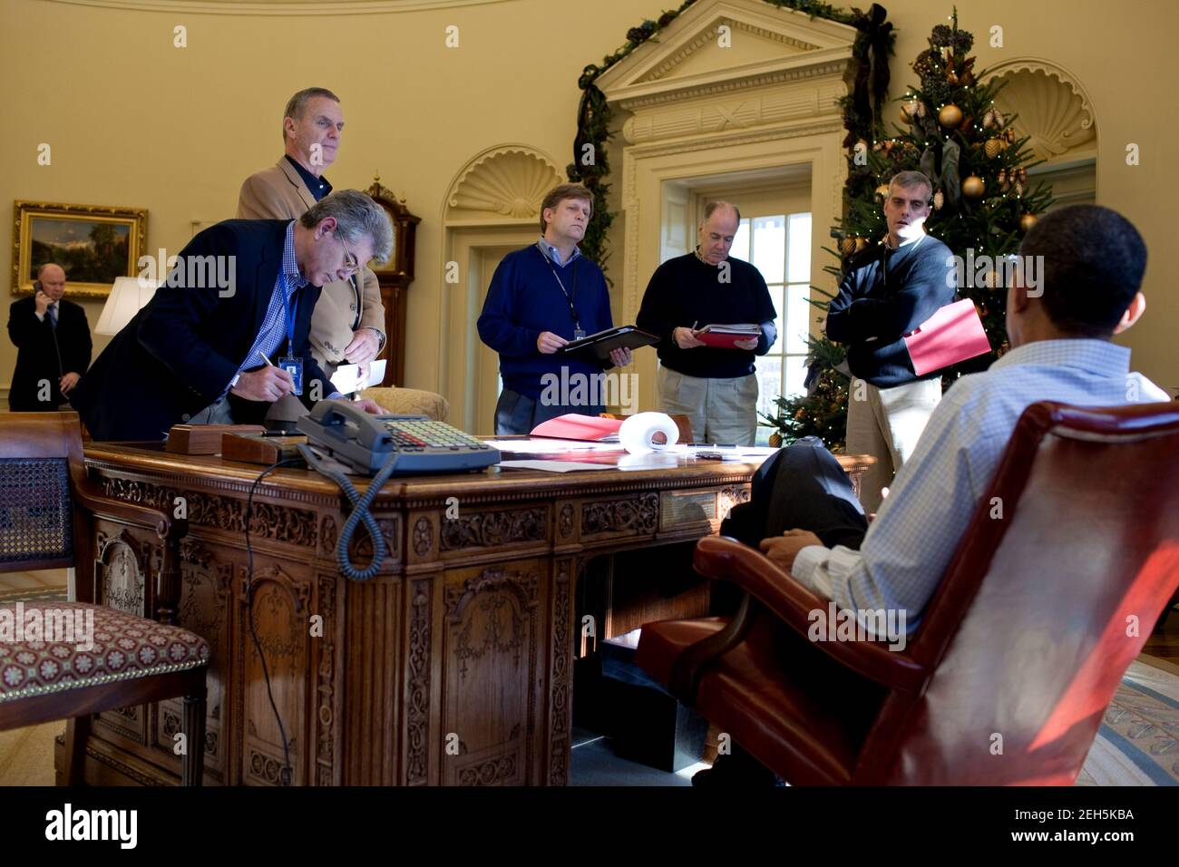 President Barack Obama meets with, from left, Special Assistant to the ...