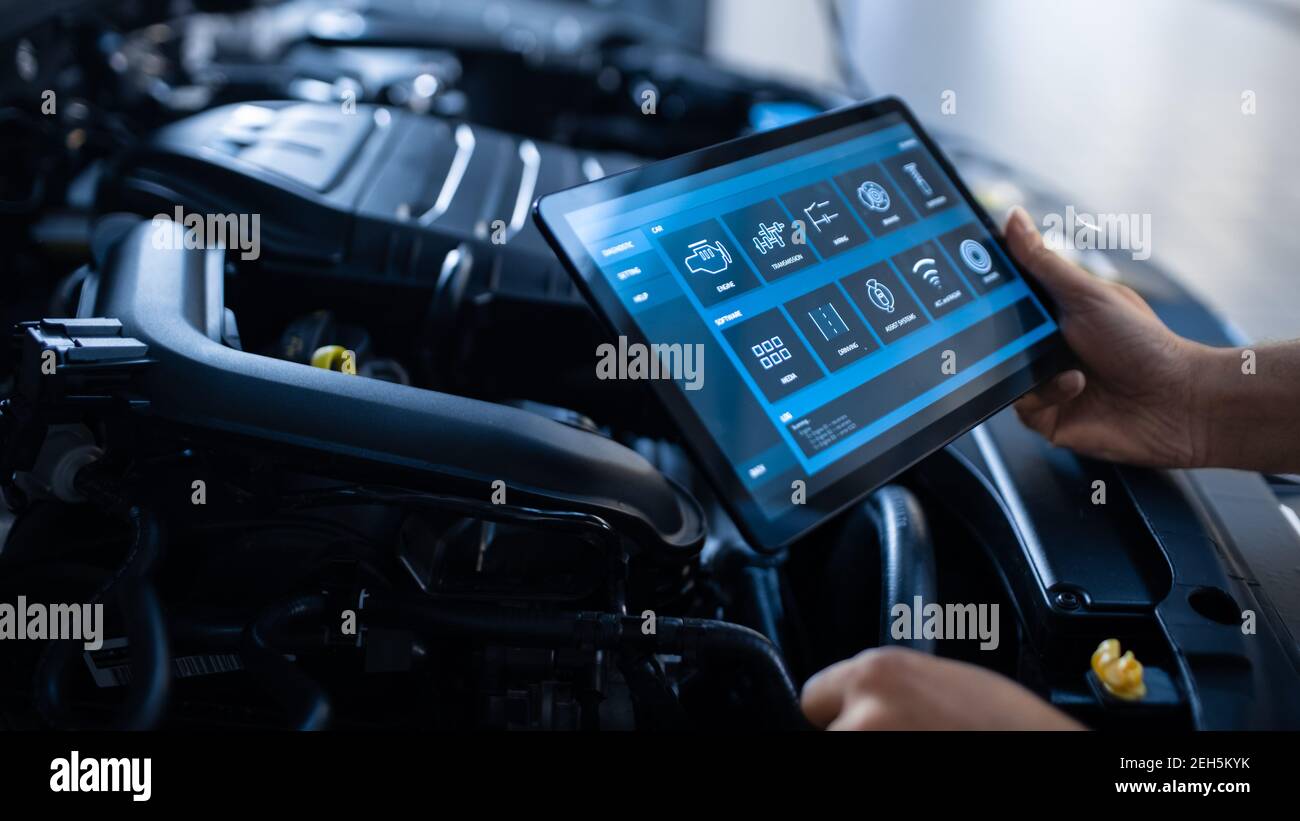 Repairman in car service uses hi-res stock photography and images - Alamy