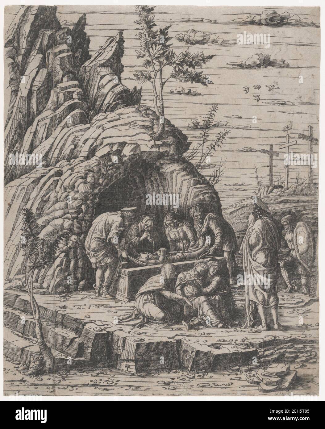 The Entombment of Christ who is being lowered by two men into a stone ...