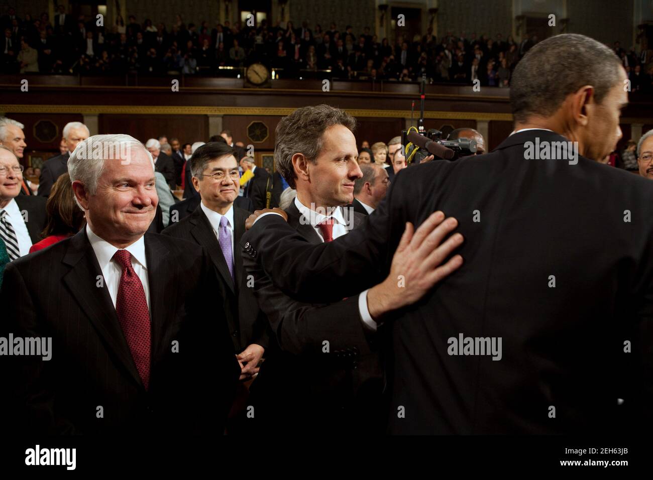 Treasury Secretary Timothy F. Geithner pats President Barack Obama on ...
