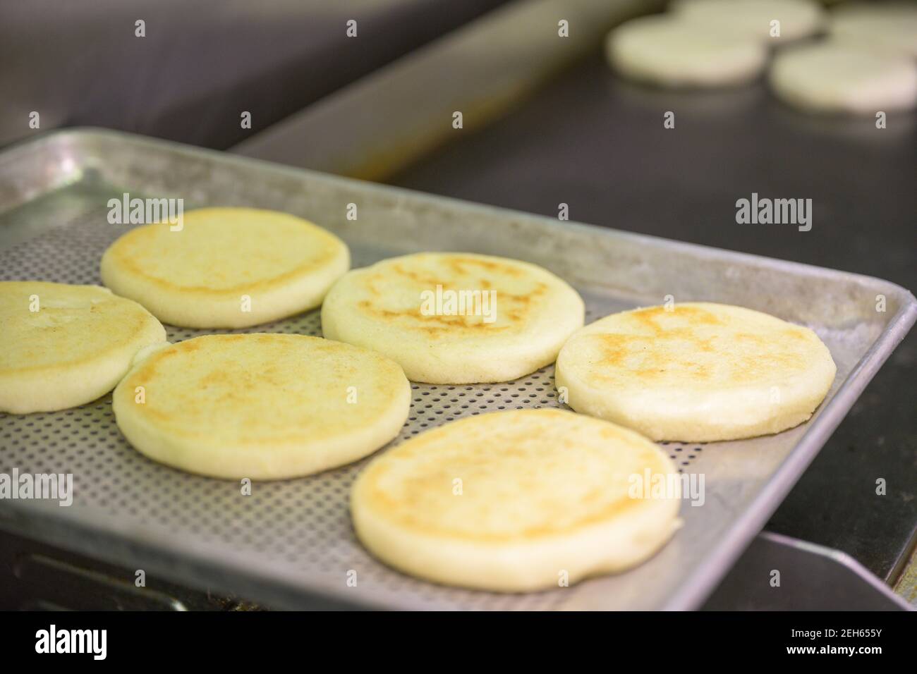 Closeup shot of the process of making sweet Arepas, Venezuelan ...