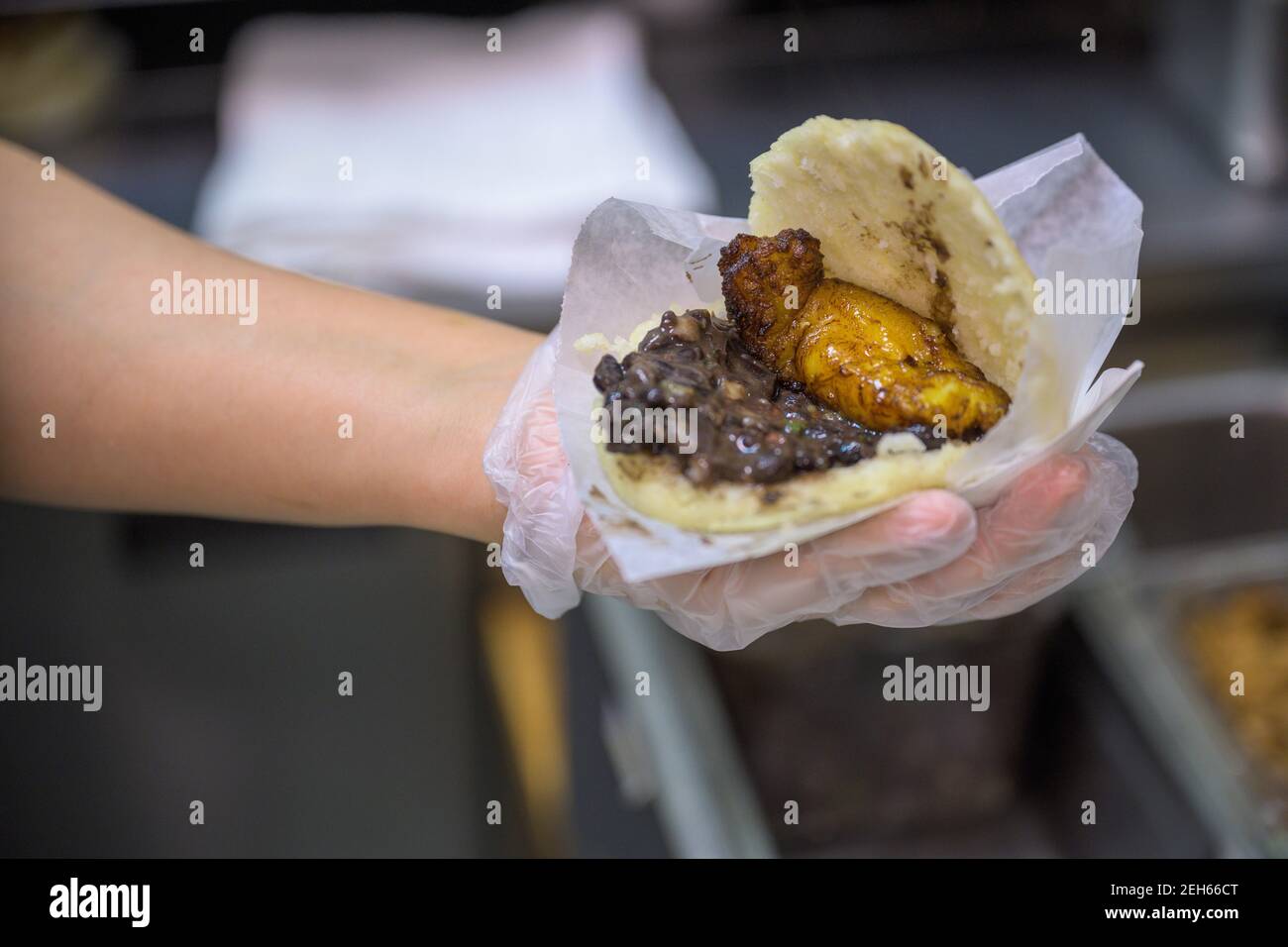 Chef making a delicious Arepa, Venezuelan traditional cuisine Stock ...