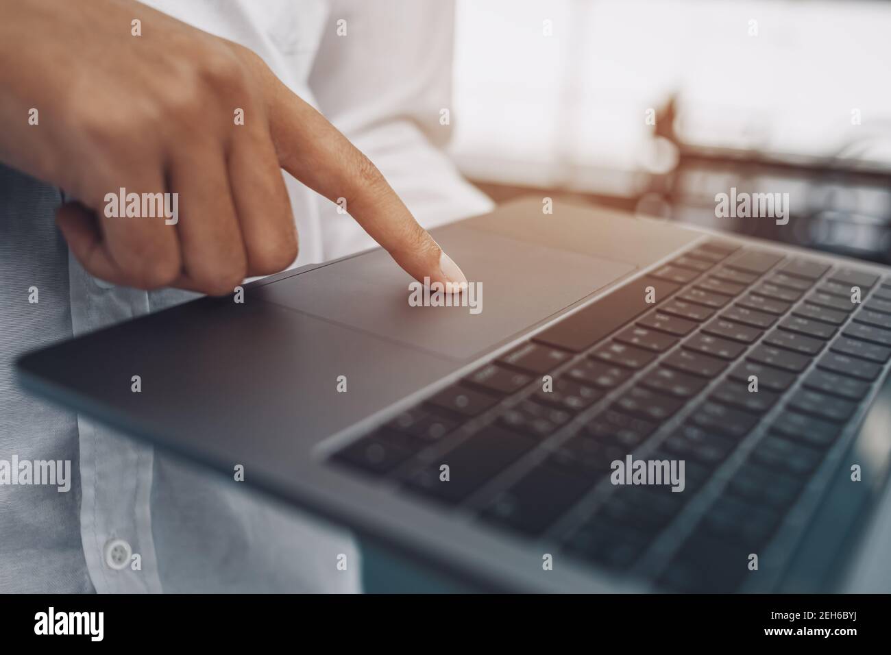 Finger on trackpad of computer hi-res stock photography and images - Alamy